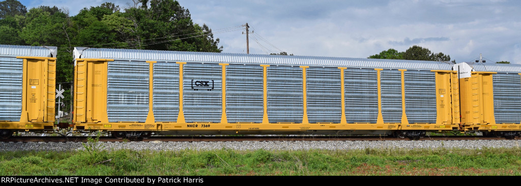 NKCR 7369 Trinity 89-foot 4-inch flat car with auto rack and CSX logo in CSX Junta Yard in ...